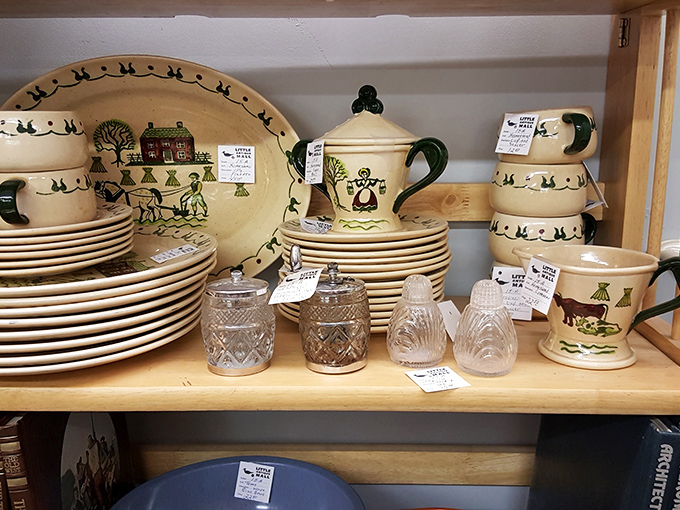 Folk art dishware that makes you wonder if your morning coffee might actually taste better served with a side of pastoral charm.