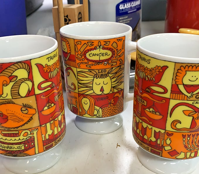 Zodiac mugs that promise to tell your fortune while holding your coffee&mdash;the Leo looks particularly smug about it.