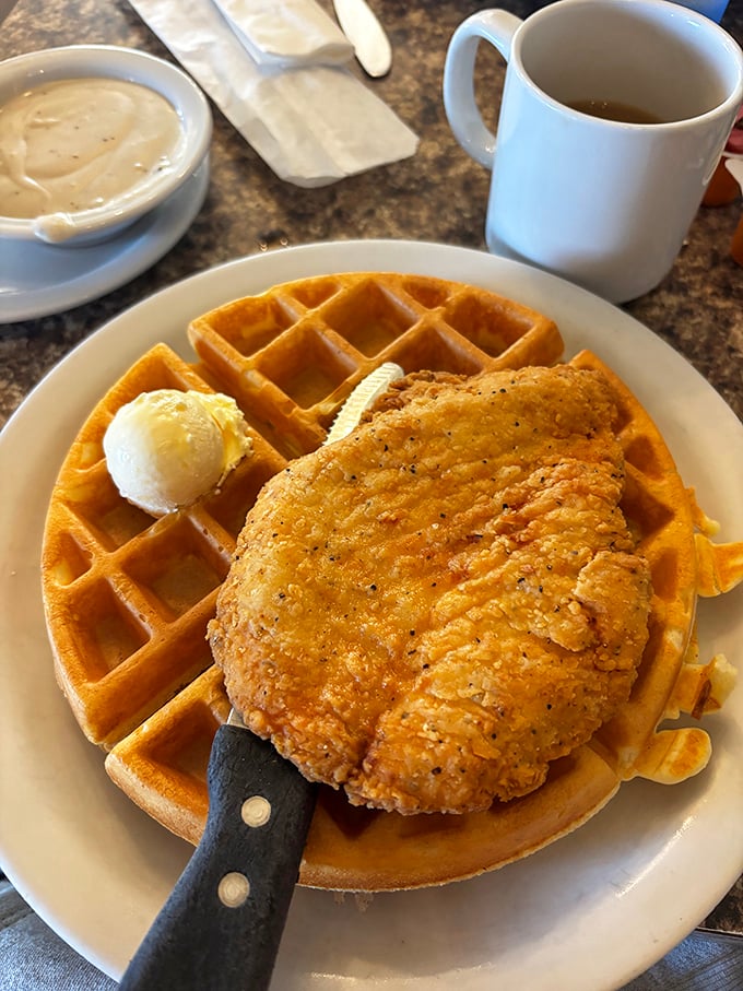 The chicken and waffle combo that answers the eternal question: "Why choose between breakfast and lunch when you can have both on one magnificent plate?"