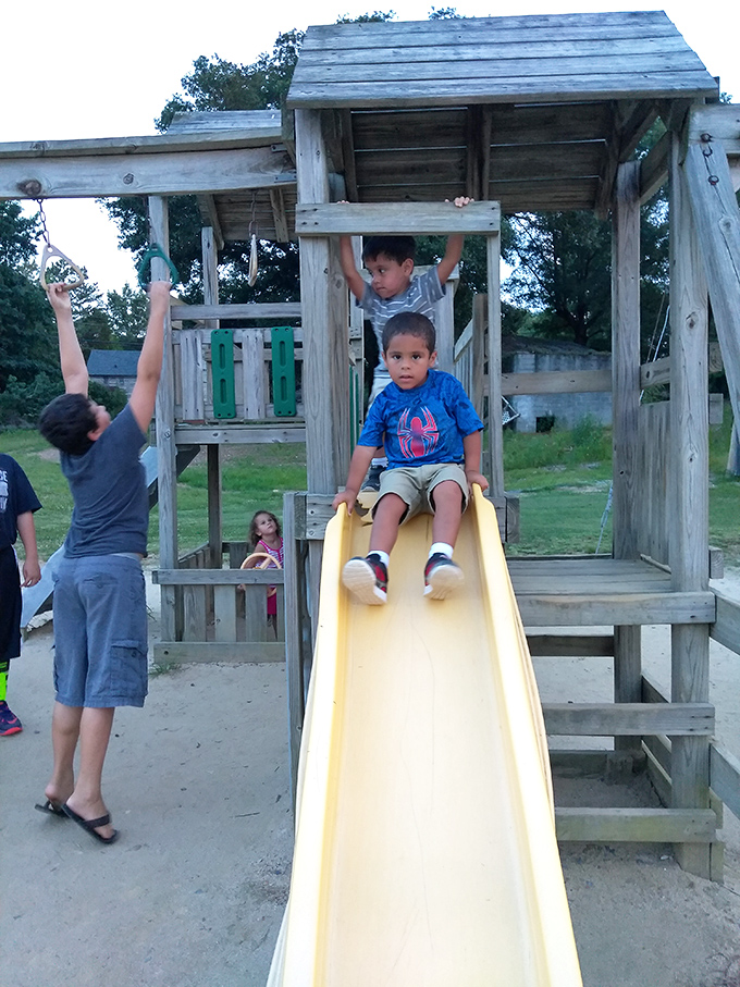 Playground adventures before showtime&mdash;where kids burn energy on slides while parents secretly hope for just enough tiredness to ensure movie peace.
