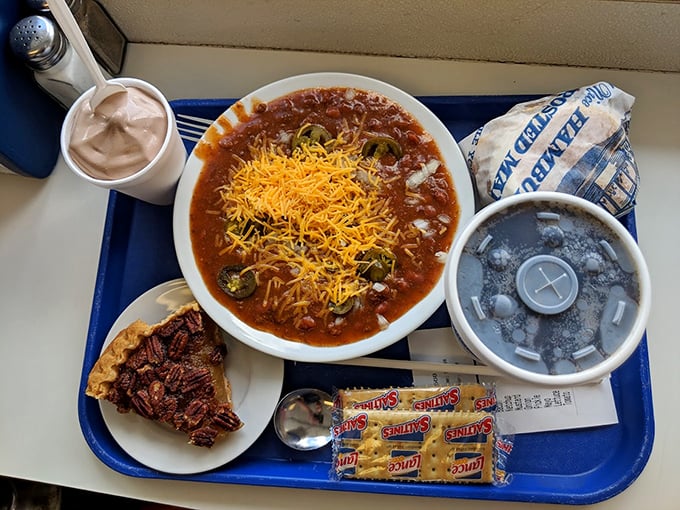 That bowl of chili isn't just lunch; it's a hug in food form, topped with enough cheese to make Wisconsin proud.