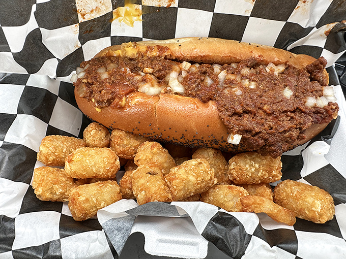 Chili dog nirvana with golden tots standing by. This is comfort food that understands its assignment perfectly.