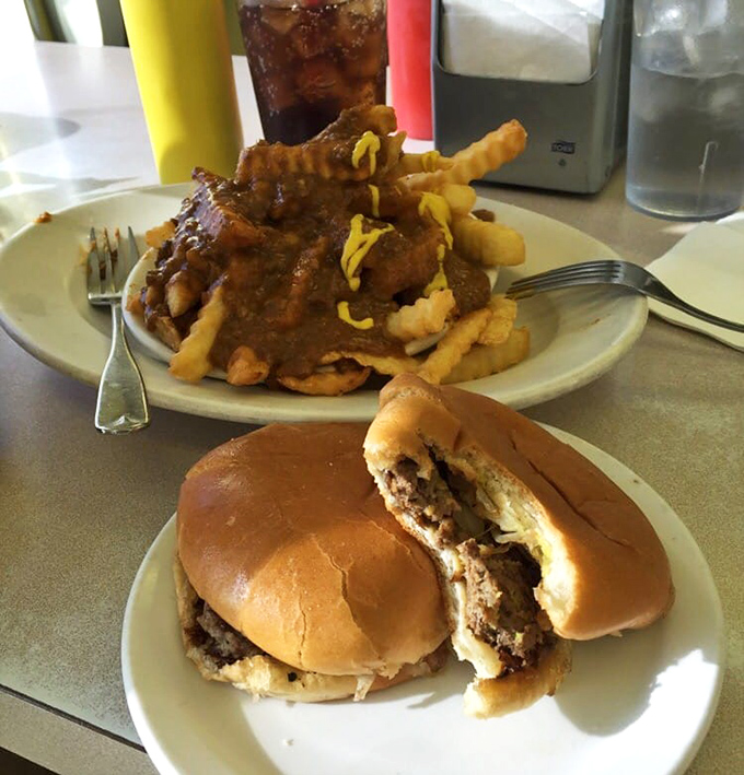 Chili fries that demand to be shared but inspire selfishness. That burger's already missing a bite&mdash;someone couldn't wait for the camera.