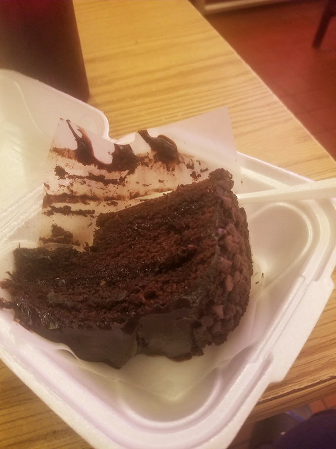 A decadent slice of chocolate cake &ndash; the sweet finale to a satisfying meal at Louisville's beloved 24-hour diner.