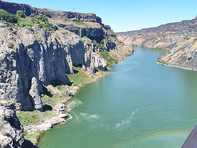 The dramatic canyon walls tell Earth's autobiography in layers of stone. Each striation represents a chapter millions of years in the making.
