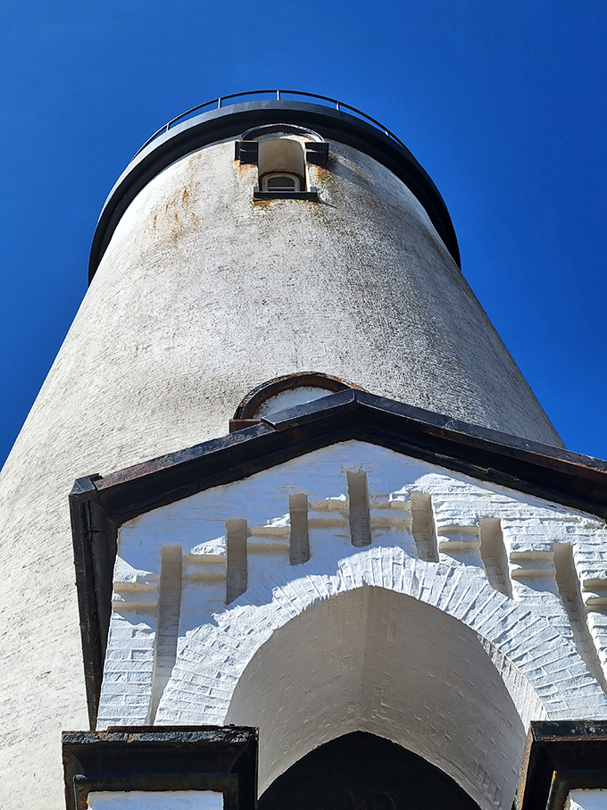 The lighthouse's architectural details reveal craftsmanship from an era when buildings were built to outlast their builders.