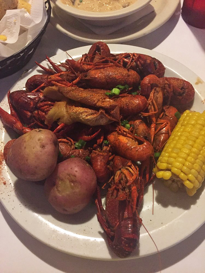 A crawfish boil that demands both your attention and your willingness to get messy. Dignity is overrated when food tastes this good.