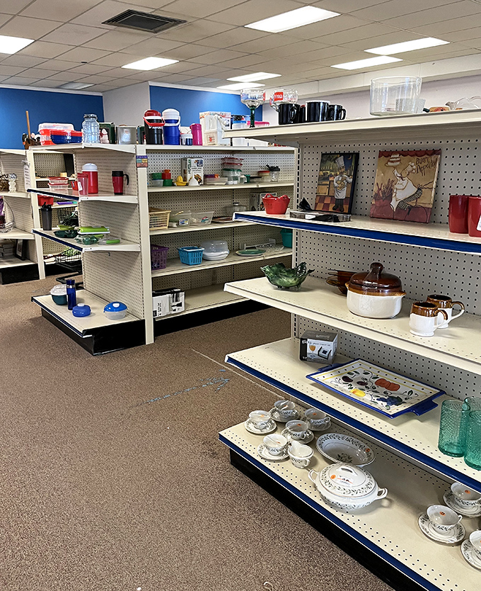 Someone's wedding china and everyday dishes sharing shelf space in a delightfully democratic display of dining possibilities.