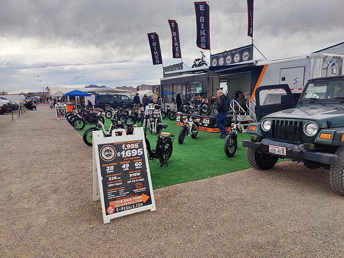 E-bikes lined up like modern cavalry, ready to conquer both desert trails and your neighbor's envy.