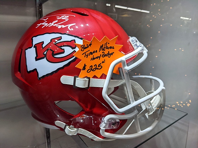 A signed Chiefs helmet that carries more Missouri dreams than the state lottery. Some treasures aren't measured in carats but in quarterback signatures.