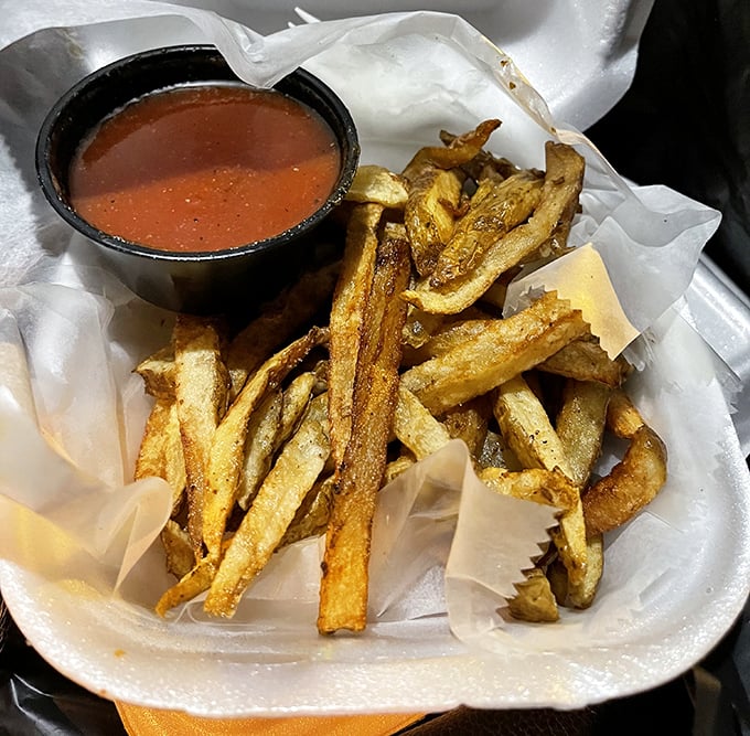 Hand-cut fries with that perfect golden crunch, ready for their supporting role in the barbecue symphony.