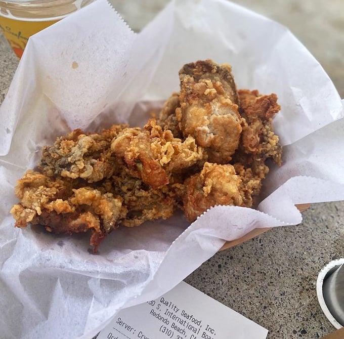 Golden-fried oysters that crunch like autumn leaves but taste like summer waves. The perfect handheld treasure from the deep.