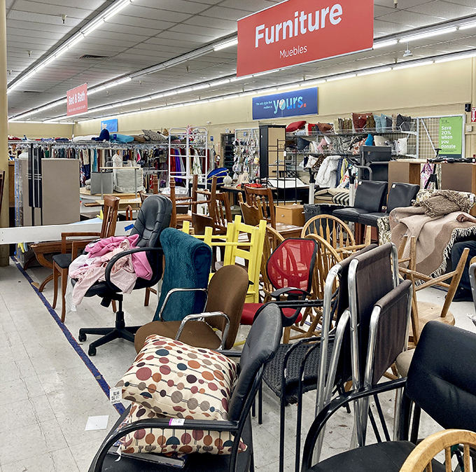 The furniture section: where office chairs mingle with dining sets in a mismatched symphony of possibility. That yellow chair could be the conversation piece your living room's been missing.