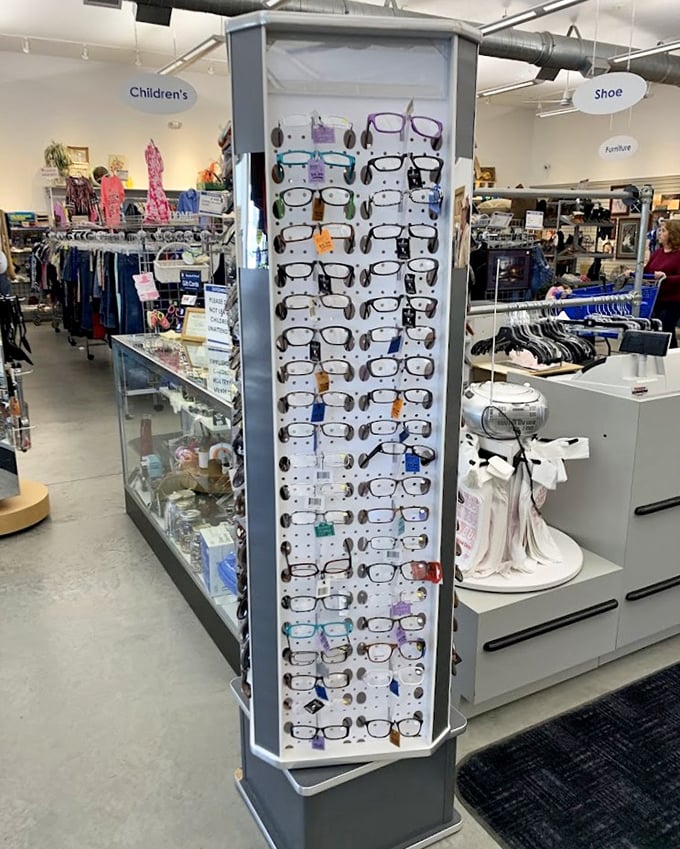 The eyewear display stands like a monument to second chances &ndash; someone's discarded frames could become your signature style statement.