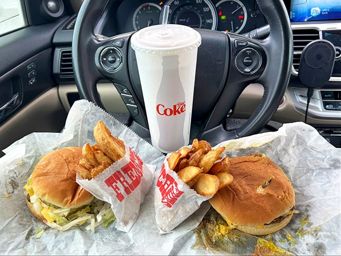 Car dining at its finest—the steering wheel becomes your table and napkins become your best friend. Some of life's greatest pleasures are the messiest.