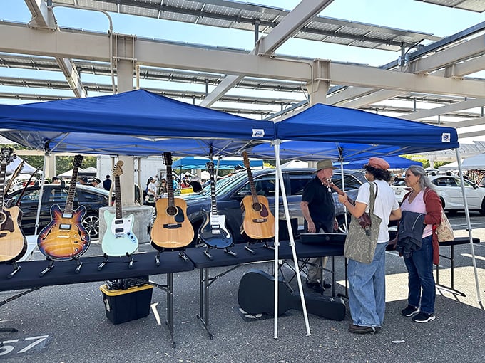 Six-string dreams hanging in the California sun. Each guitar carries potential anthems, love songs, and at least one accidental "Stairway to Heaven."
