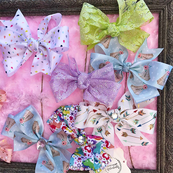 Hair bows that transform ordinary ponytails into celebrations—like having a tiny parade following you around all day. That sparkly purple one's calling my name!