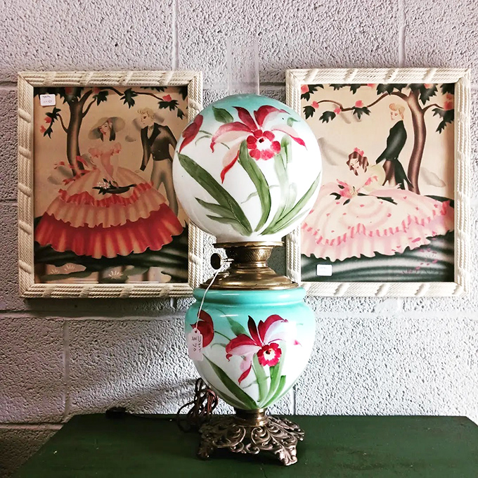 This hand-painted floral lamp flanked by vintage Southern belle portraits creates the perfect trifecta of grandmotherly elegance.