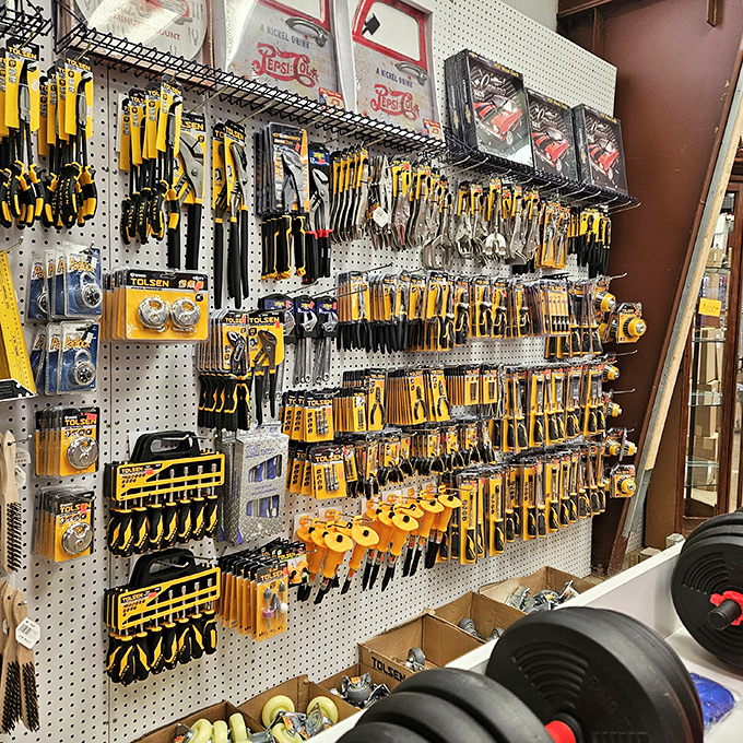 Tool heaven for DIY enthusiasts! This pegboard display would make Tim "The Tool Man" Taylor grunt with approval.