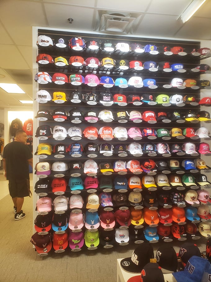 Baseball caps create a colorful mosaic of team spirit, covering every franchise from coast to coast.