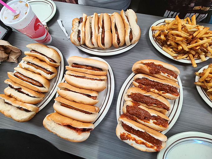 Now this is a feast! A glorious assembly line of chili dogs and fries—the simple, beautiful architecture of deliciousness. Get ready for an epic snap!