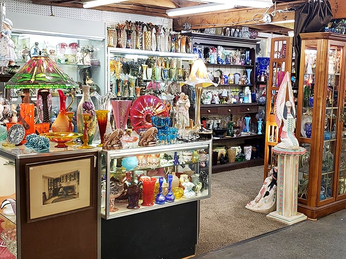 A kaleidoscope of vintage glass catches the light like a disco ball for antique lovers. Each piece holds memories of dinner parties long since digested.