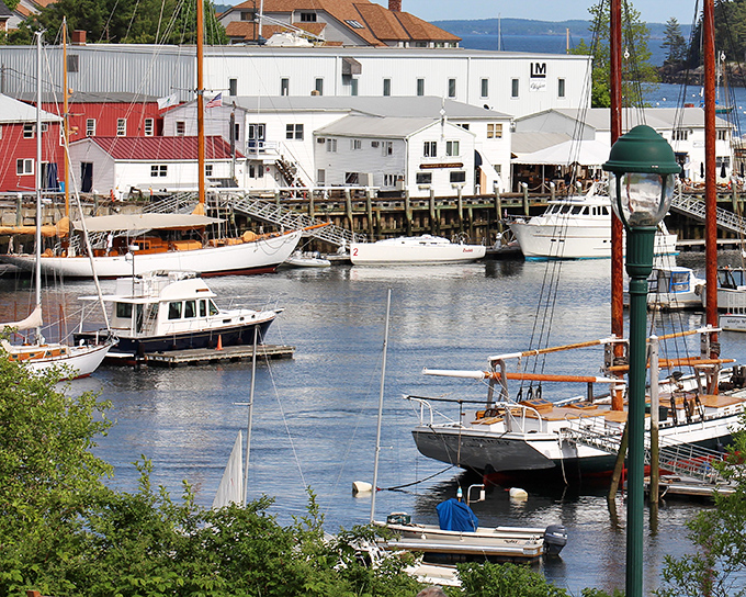 The working waterfront balances function and beauty, where weathered docks support both livelihoods and daydreams.