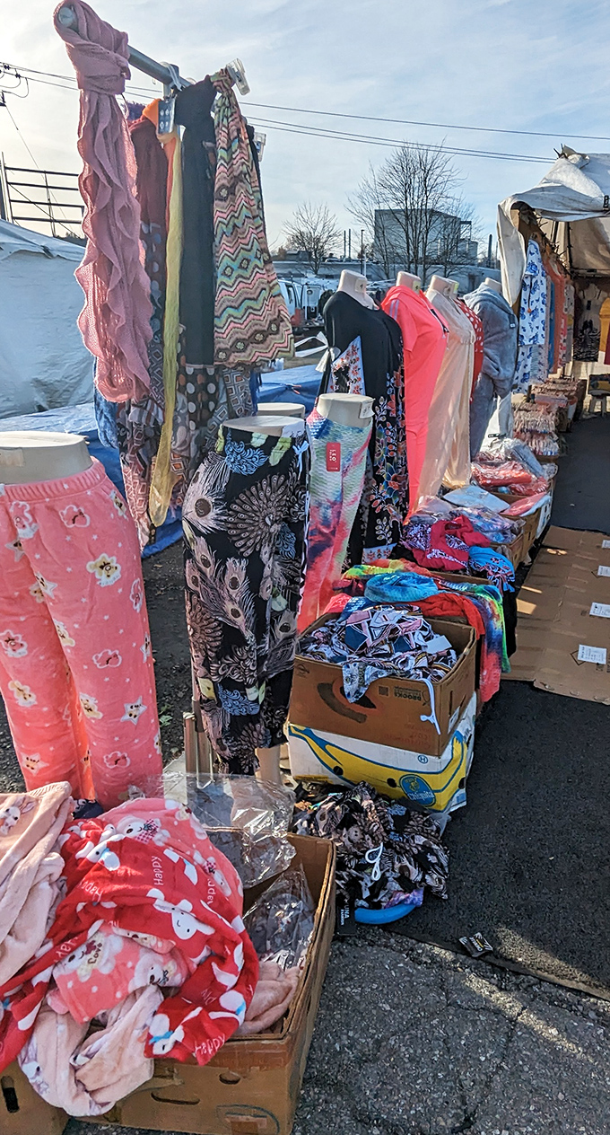 Winter doesn't stop the outdoor vendors. Those colorful fabrics pop against the snow like tropical birds in a blizzard.