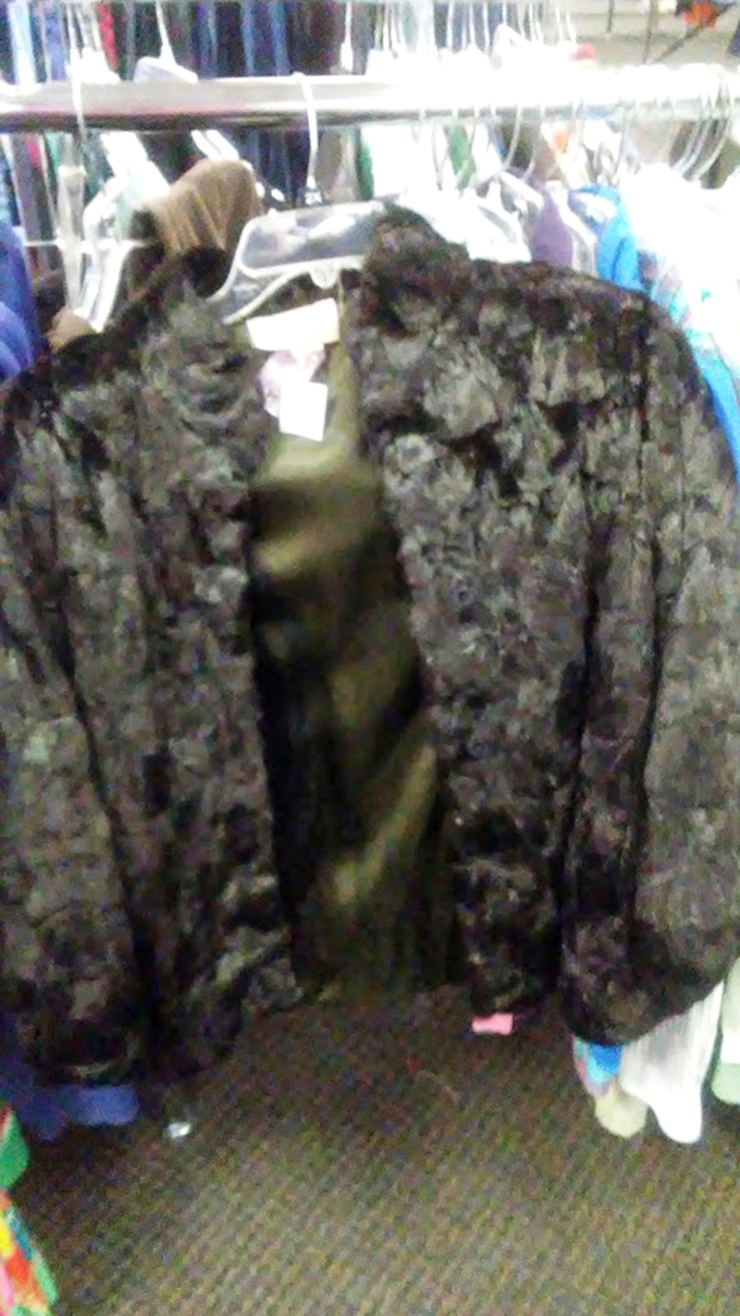 Vintage brocade jackets hang patiently, waiting for someone who appreciates that fashion, like history, always repeats itself.