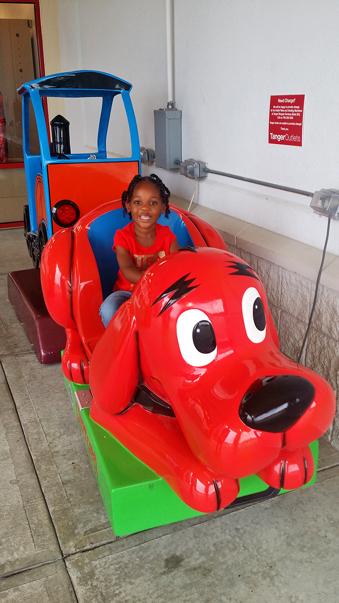 That smile says it all&mdash;kiddie rides at the outlets provide the perfect negotiation tool when you need "just one more store" with the little ones.