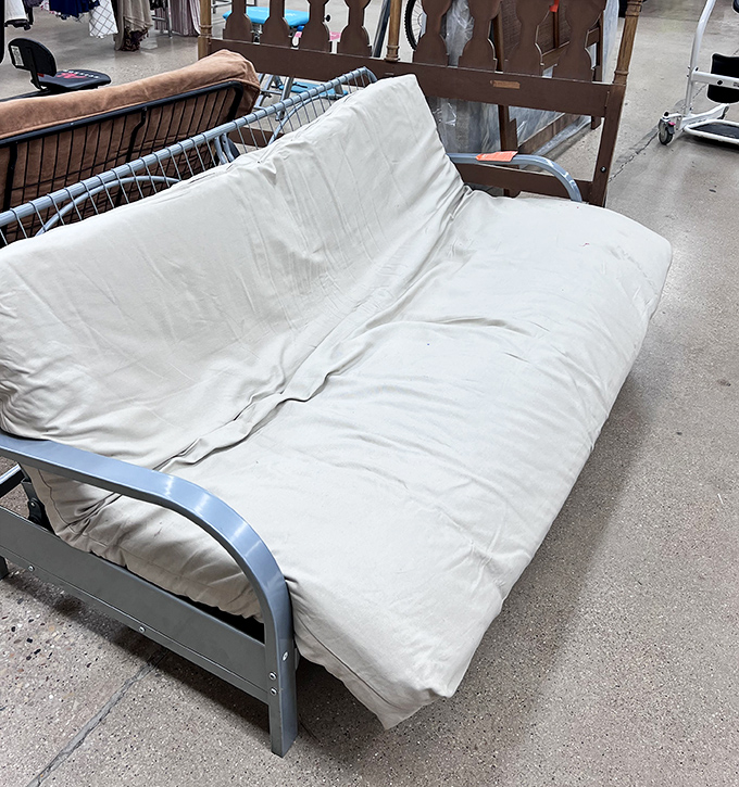 College apartment starter kit or guest room solution? This futon has stories to tell—and hopefully none involve pizza stains.