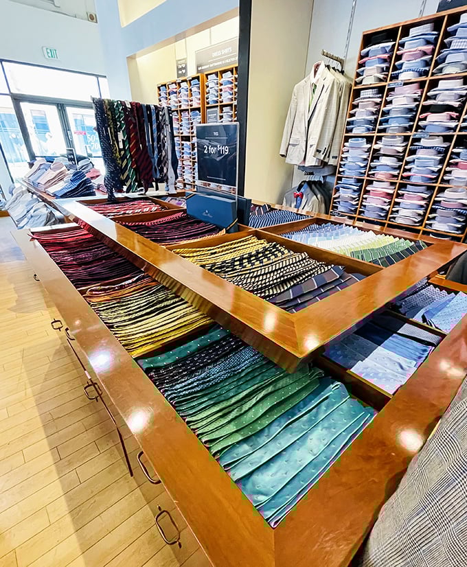 A rainbow of neckties arranged with military precision. More options than a Netflix menu, but somehow easier to make a decision.
