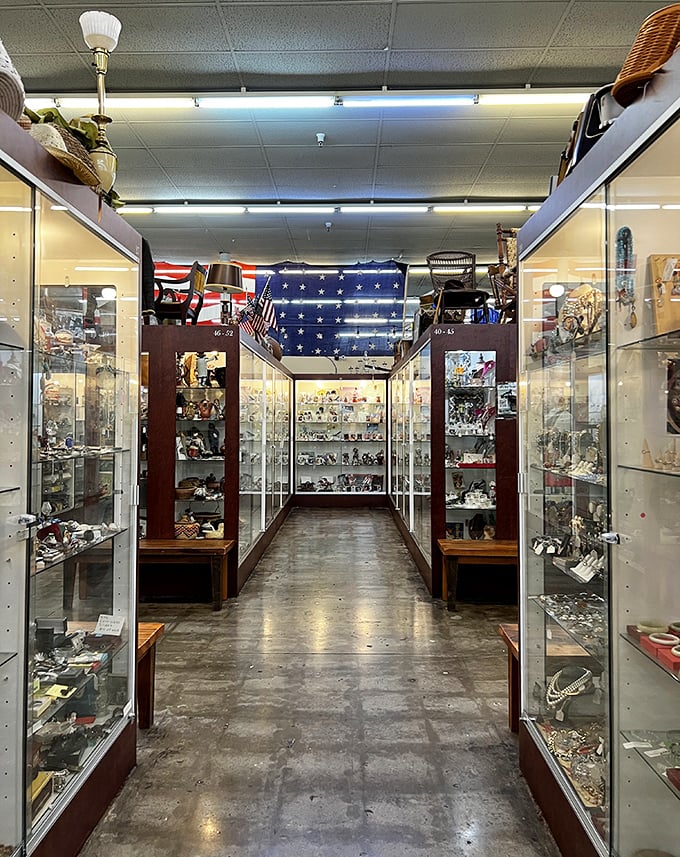 Glass cases protecting precious memories, with an American flag standing guard overhead. Some treasures deserve their own museum-quality display.