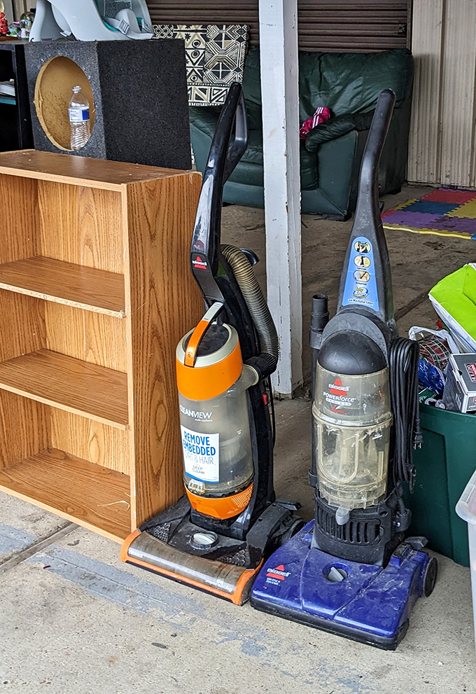 Vacuum cleaners standing at attention like eager soldiers. "Pick me!" they seem to say. "I'll actually work, unlike your teenager!"