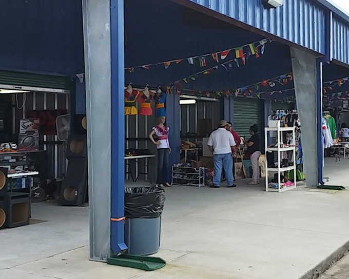 Under the corrugated roof, treasures await while shoppers browse at their own leisurely Saturday pace.