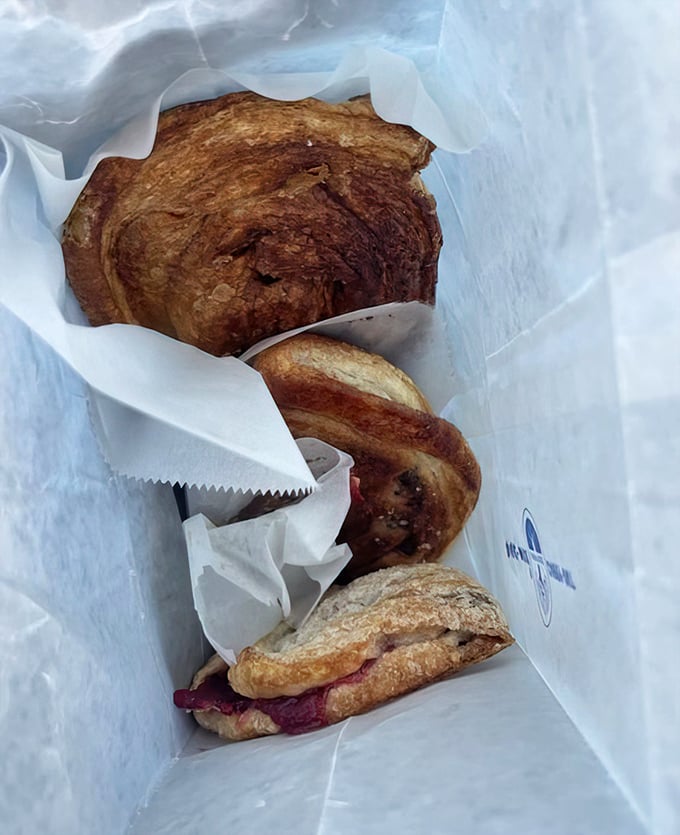 A white paper bag holds the ultimate Wisconsin souvenir &ndash; more memorable than any t-shirt and guaranteed to make you the hero of any gathering.