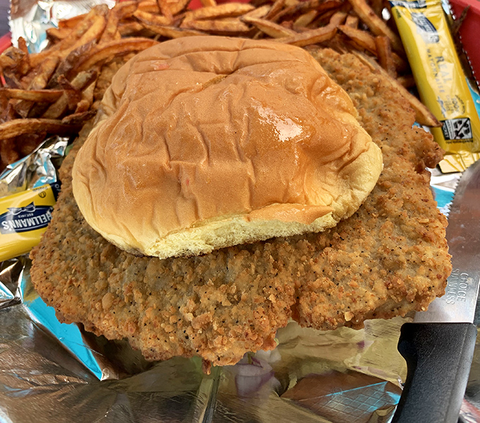 The pork tenderloin sandwich laughs at your bread-to-meat ratio expectations. When your protein needs its own zip code, you know you're in the right place.
