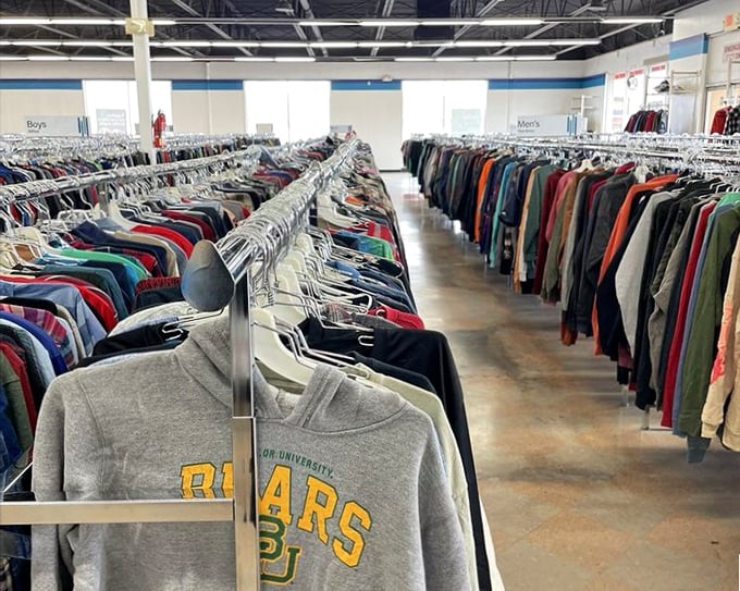 The Baylor University sweatshirt leads a colorful parade of second-hand fashion. Someone's college memories could become your cozy weekend wear.