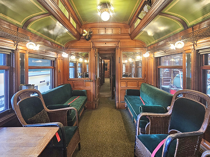 Step inside this meticulously restored passenger car and travel back to an era when train travel meant plush velvet seats and polished wood paneling.