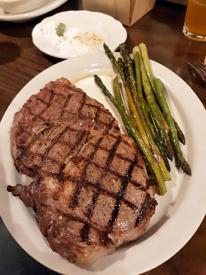 A ribeye that makes vegetarians question their life choices. Paired with asparagus to maintain the illusion of dietary balance.