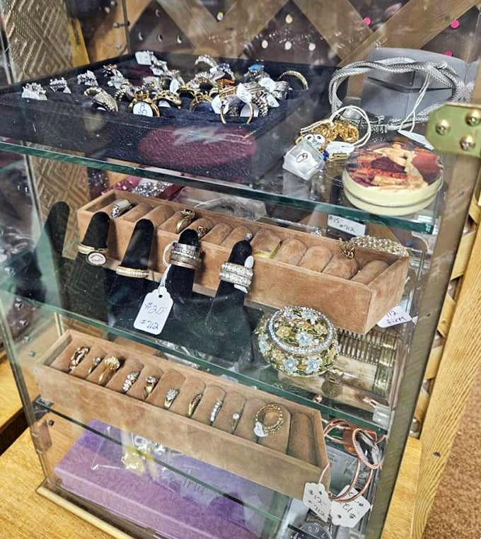 Treasure hunters rejoice at display cases filled with rings and jewelry, each piece holding secrets of previous owners.