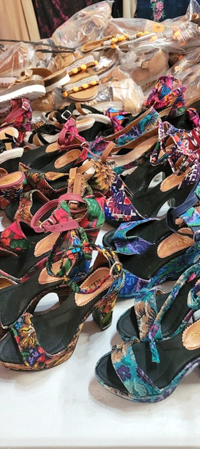 A kaleidoscope of footwear fantasies! These vibrant sandals could turn any ordinary stroll into a runway walk with their eye-popping patterns.