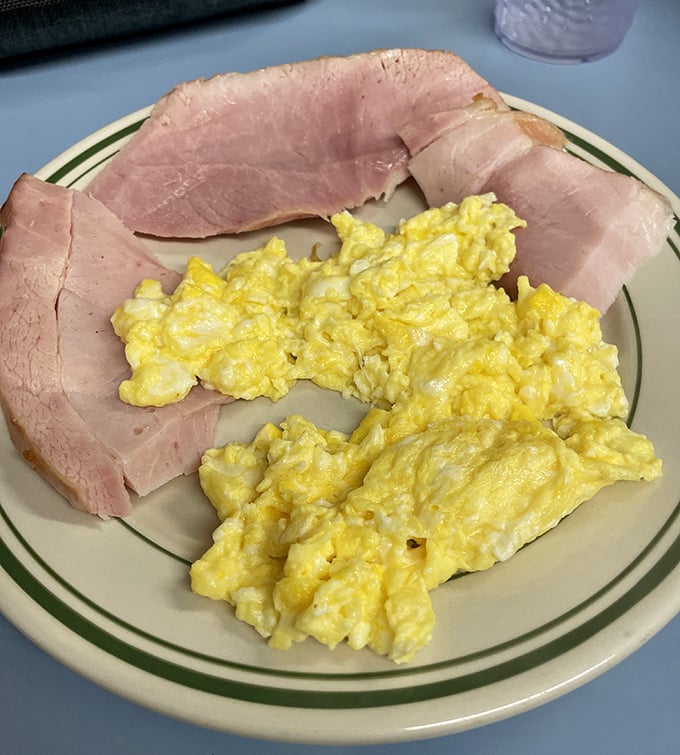 Scrambled eggs and ham: the Fred Astaire and Ginger Rogers of breakfast plates, dancing together in perfect harmony on classic diner china.