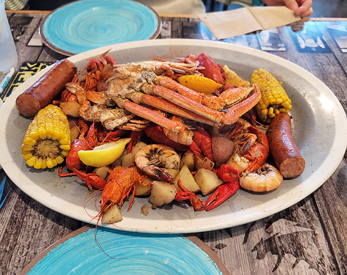The seafood boil arrives like a treasure chest &ndash; crab legs, shrimp, sausage, and corn creating a tabletop celebration that requires both hands and zero inhibitions.