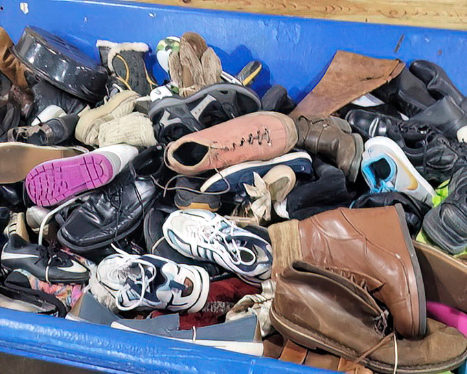 The footwear bin: where single shoes find their solemates and vintage boots await their next adventure on Nebraska sidewalks.