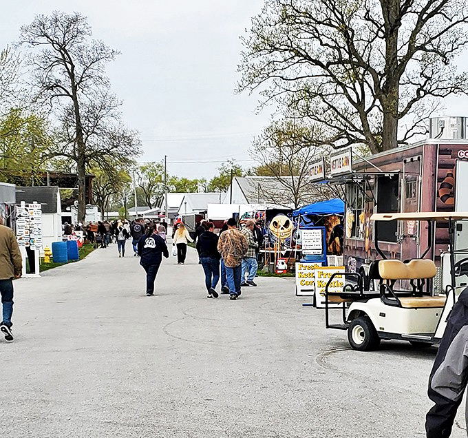 The market's main thoroughfare buzzes with shoppers on the hunt. Veterans move with purpose while newcomers pause, overwhelmed by possibilities around every corner. 