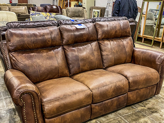 Not just a couch, but a leather-bound invitation to relax. This handsome sofa has probably witnessed countless family movie nights and is ready for its second act. 