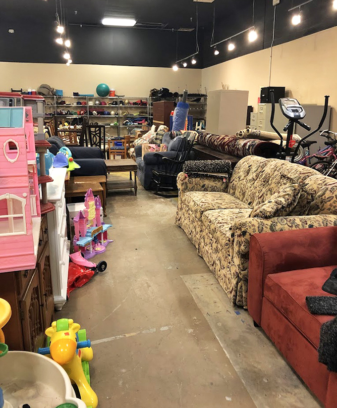 Exercise equipment and children's toys share space in a room that perfectly captures the lifecycle of New Year's resolutions and outgrown playthings.