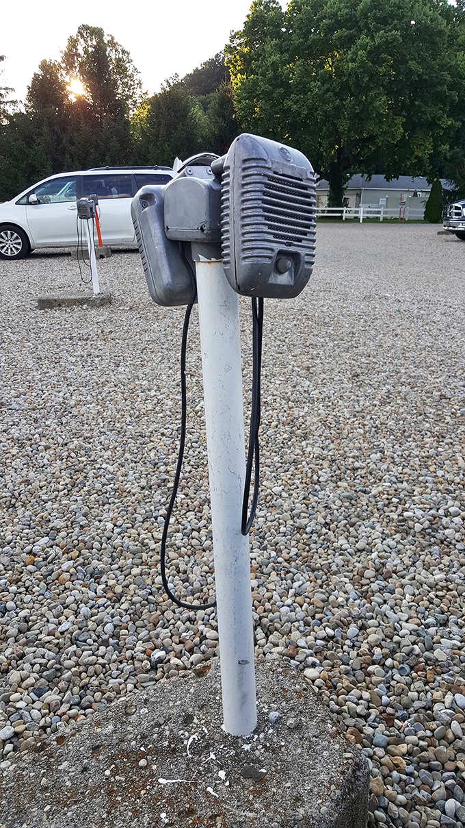 A vintage speaker pole&mdash;now mostly decorative since FM radio took over&mdash;stands as a charming reminder of drive-in history.