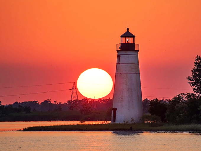 "Red sky at night, sailor's delight" takes on new meaning when this 70-foot tower joins the sunset spectacle, silhouetted against nature's daily farewell.